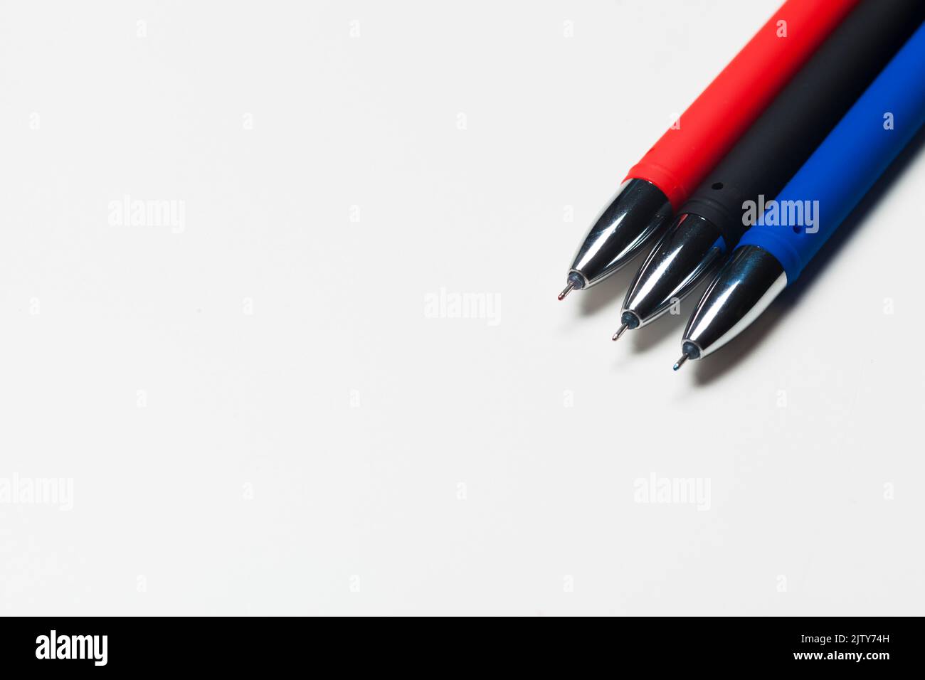 different colors pens isolated on the white background Stock Photo - Alamy
