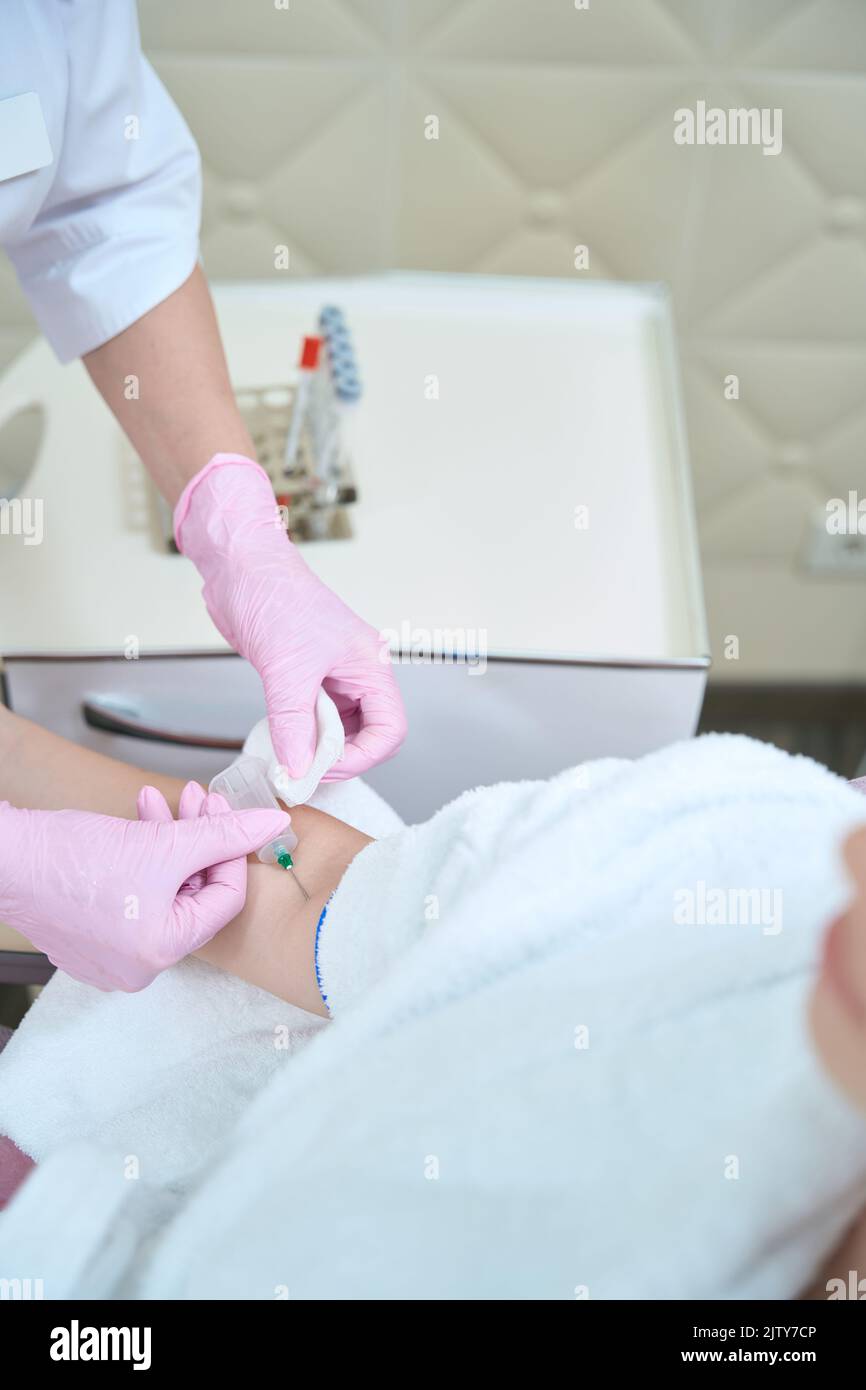 Cropped photo of blood sampling process by nurse in clinic Stock Photo ...