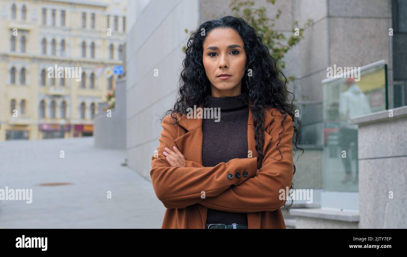 Female portrait beautiful latin business woman look over shoulder young ...