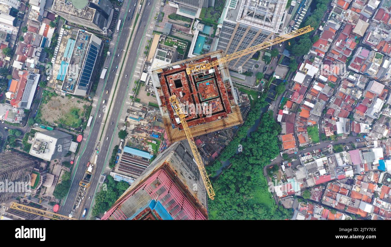 Aerial Flight Over a New Constructions Development Site with High Tower ...