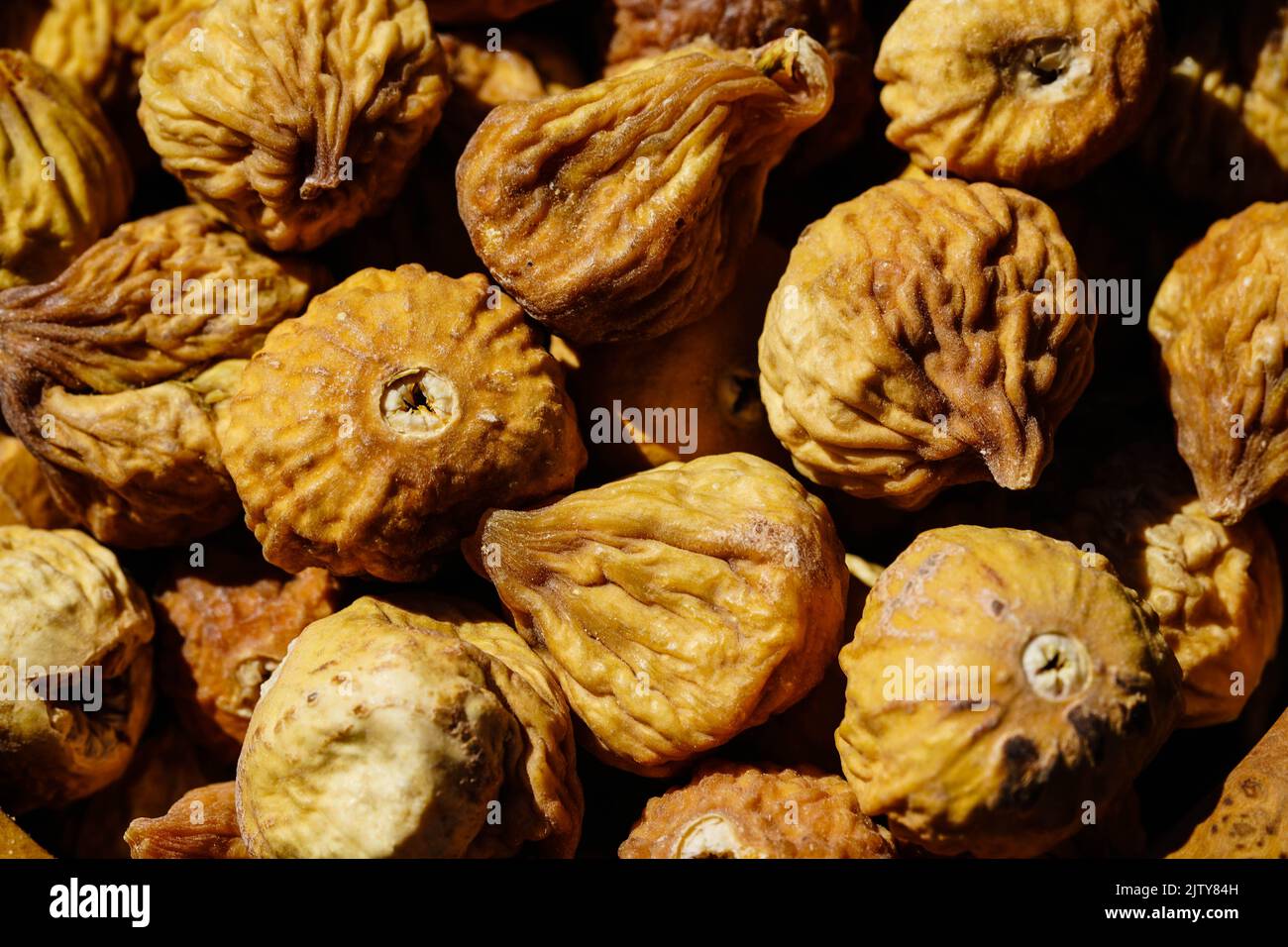 sweet dried figs in an olive wood bowl Stock Photo - Alamy