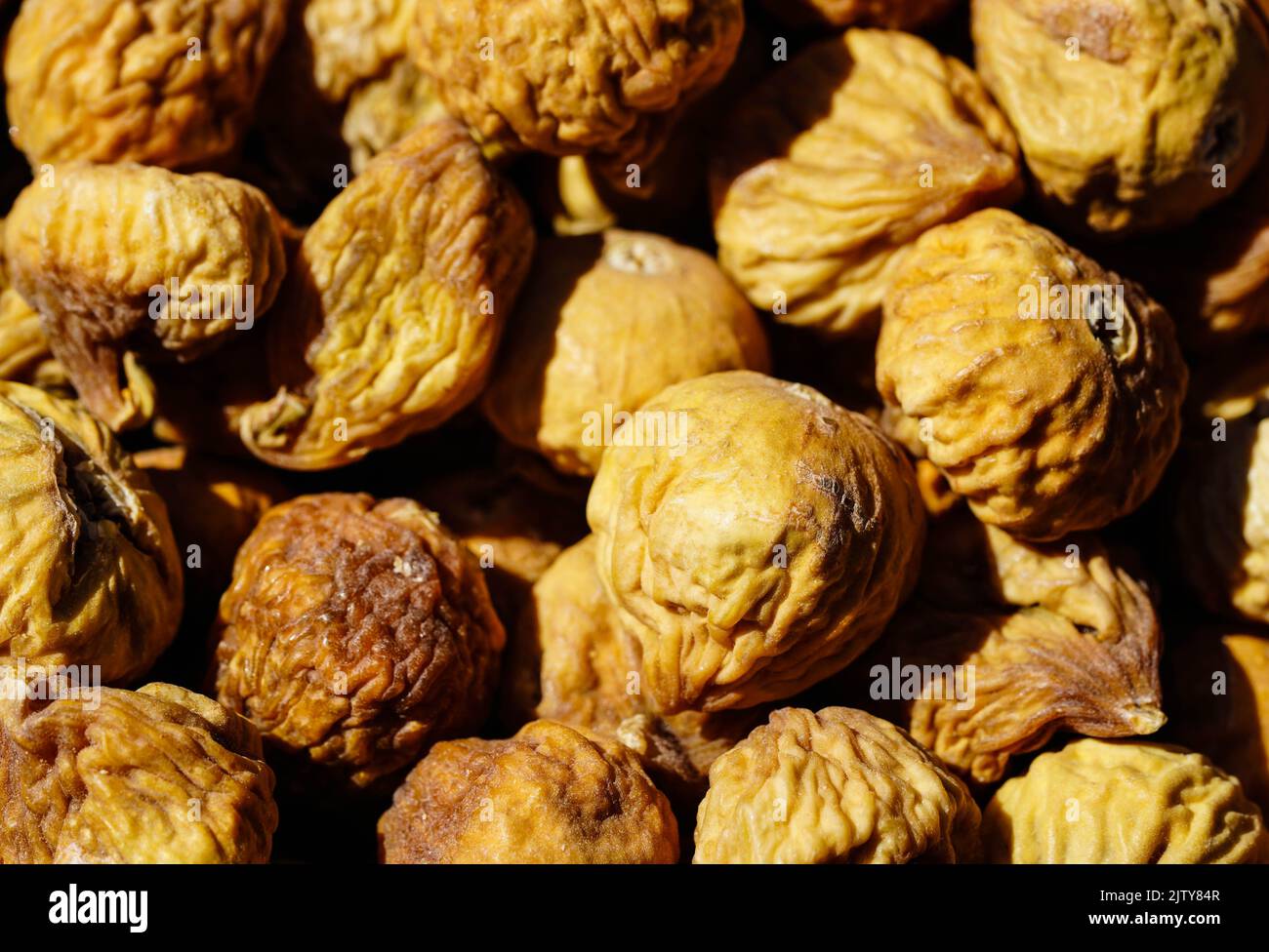 sweet dried figs in an olive wood bowl Stock Photo - Alamy