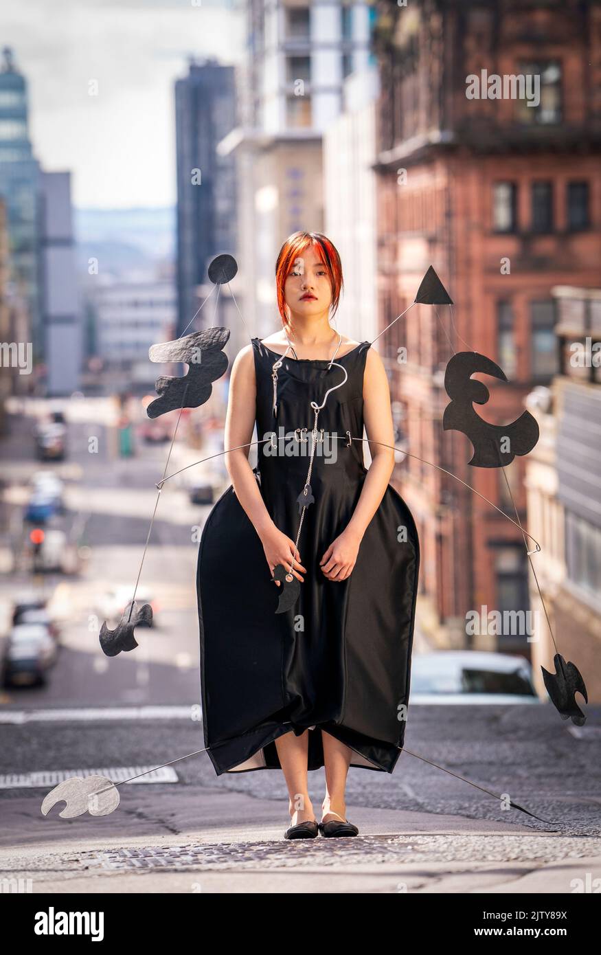 Model Yuan Chen showcases the designs of fashion student Hexi Shen ...