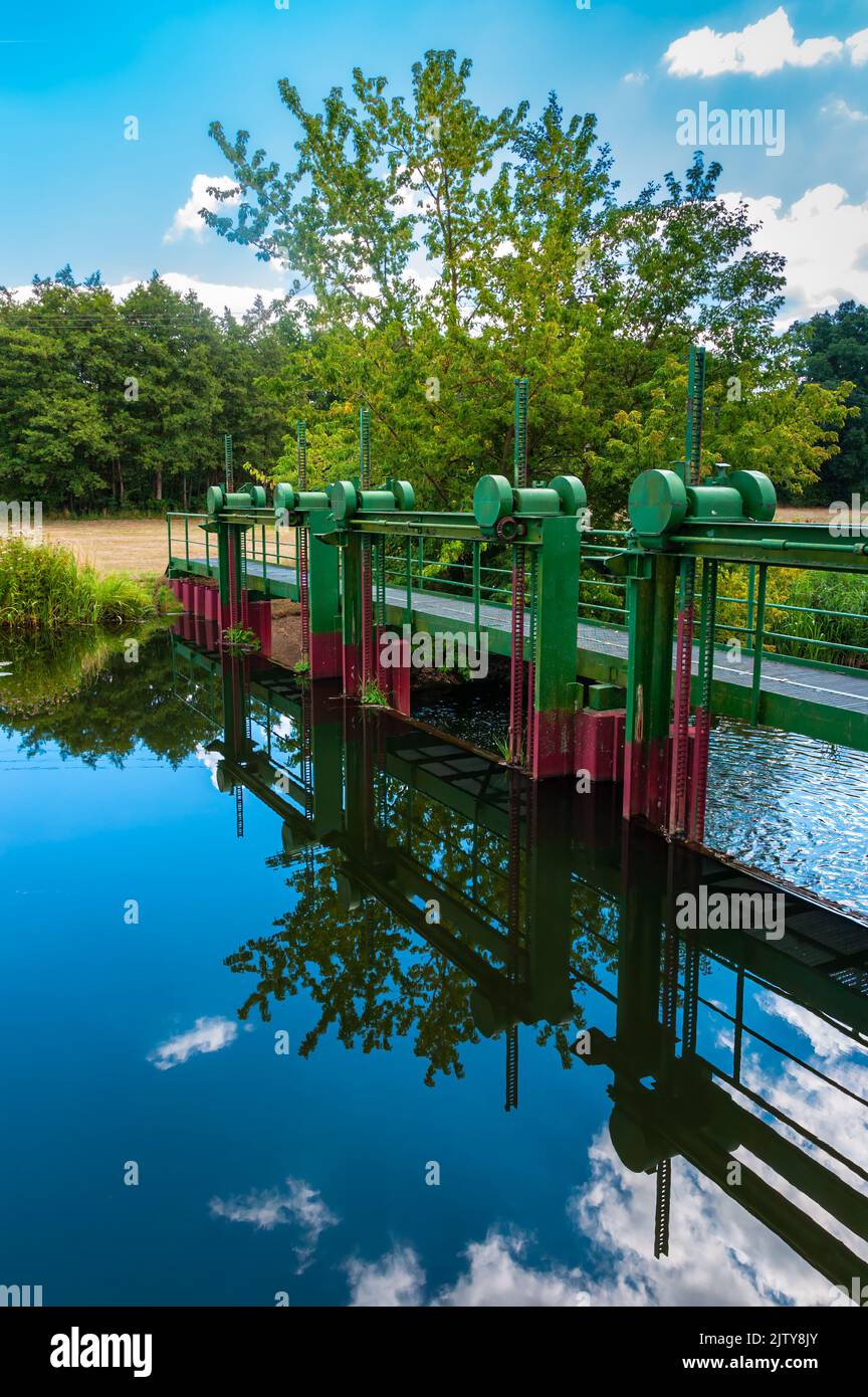 A sluice gate to regulate the level of a water channel near Calvorde ...