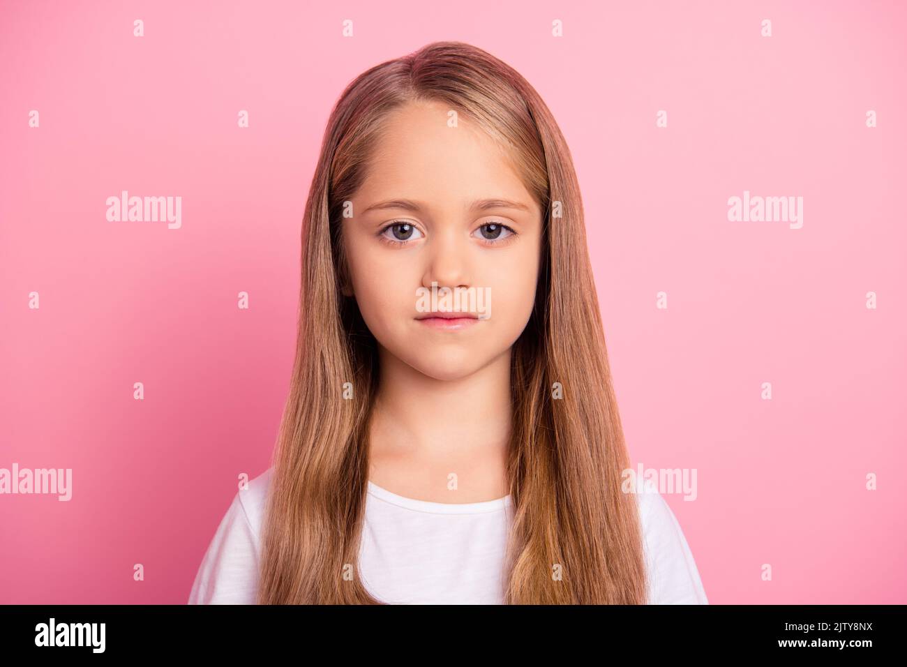 Photo of nice adorable little girl calm face look camera isolated on ...