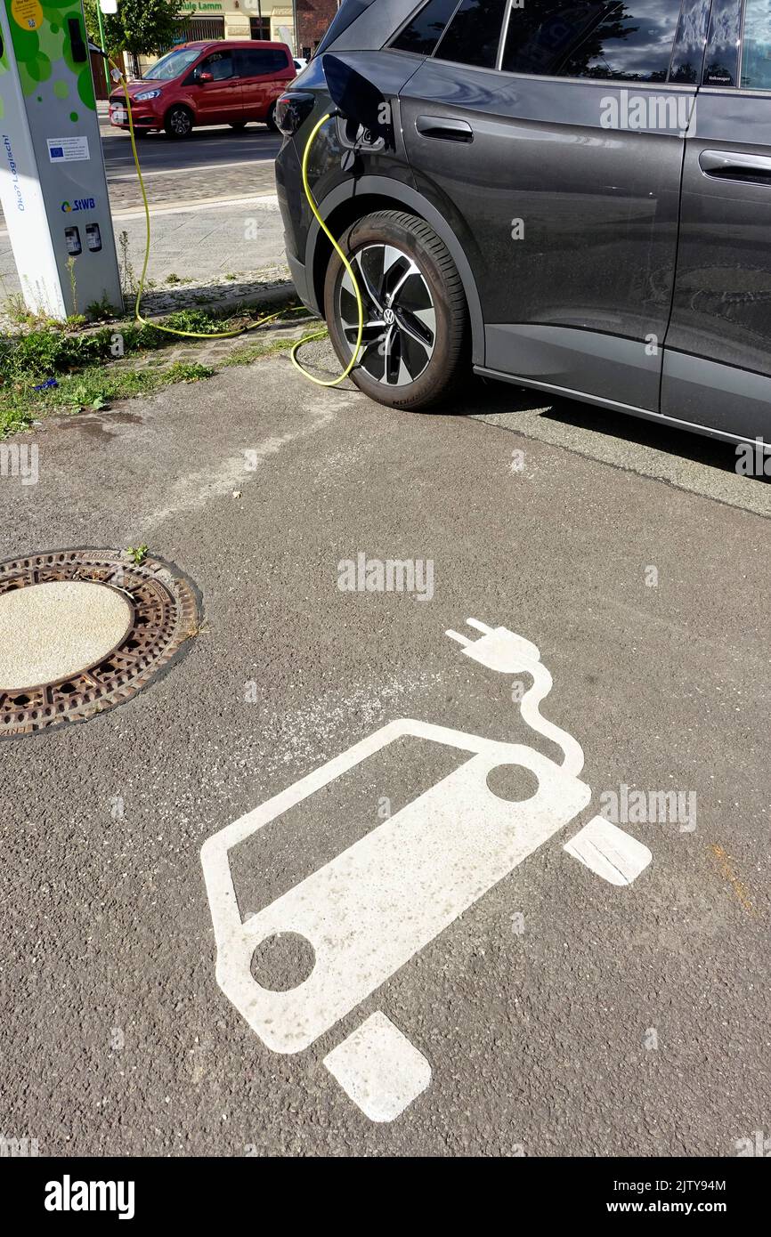 Pictogram, parking in front of a charging station for electric cars ...