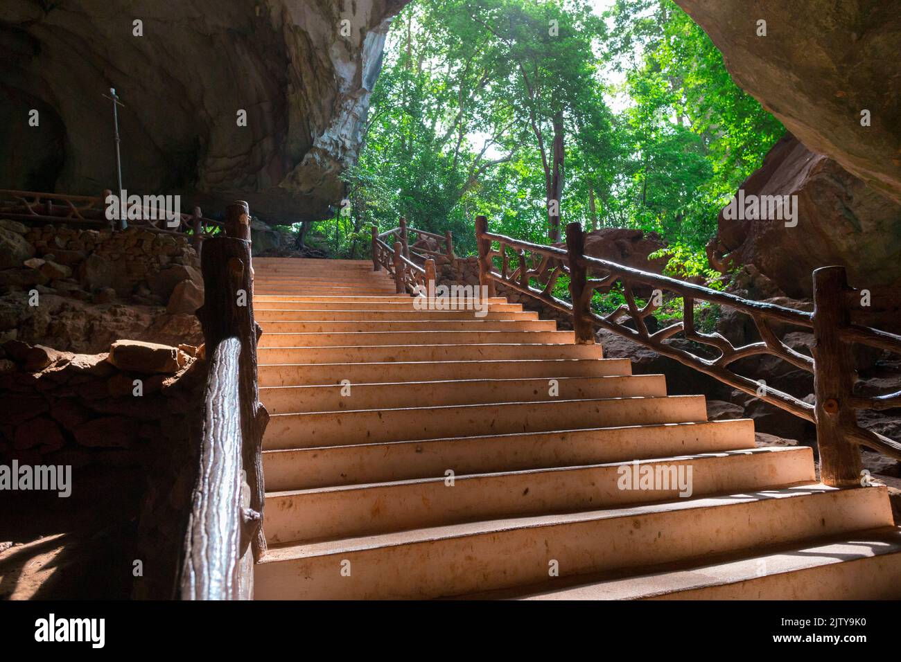 the stone cave entrance, view from inside Stock Photo - Alamy