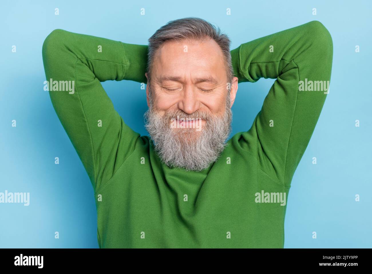 Photo of positive middle aged man hands head enjoy cozy night sleeping ...