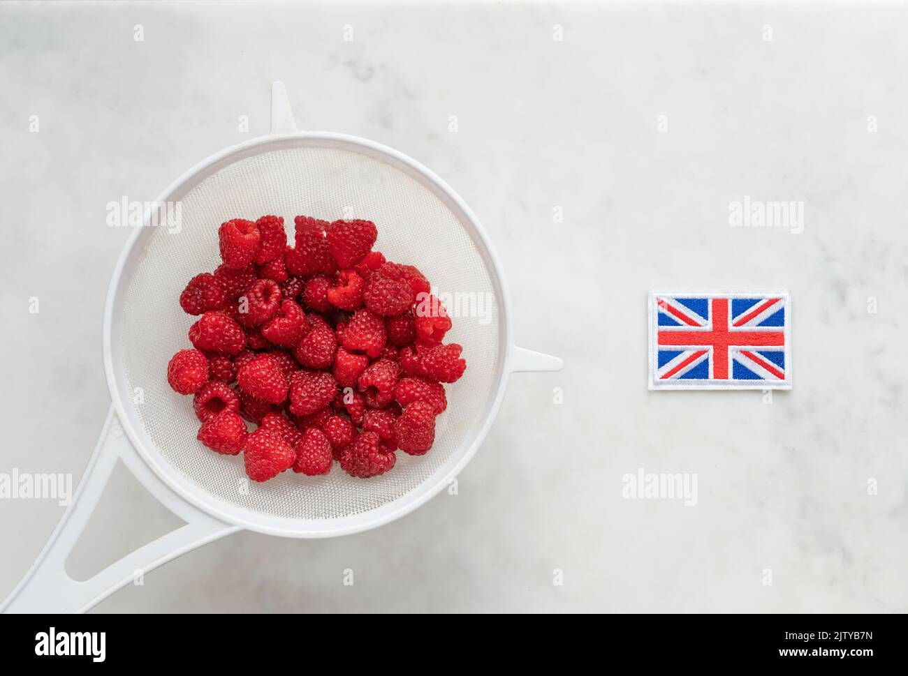 Fresh, home grown British Raspberries with the British, UK flag ...