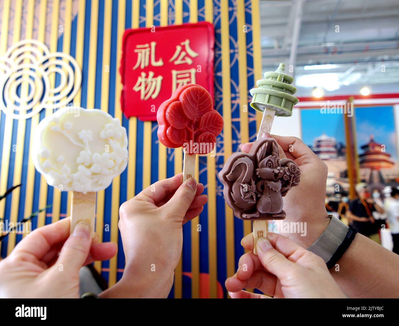 BEIJING, CHINA - SEPTEMBER 2, 2022 - Visitors pose for a photo with ...