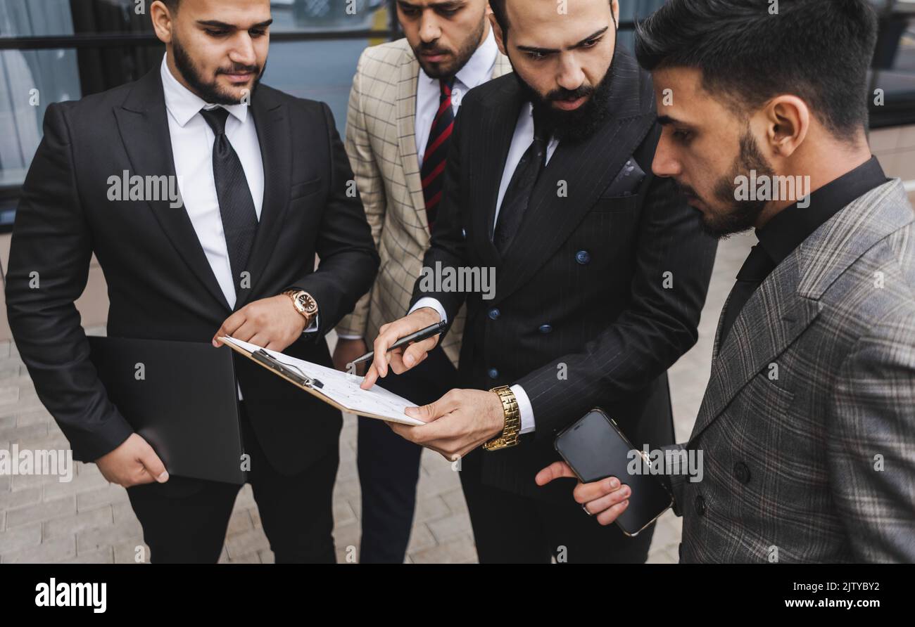 Business men partnership talk planning hi-res stock photography and ...