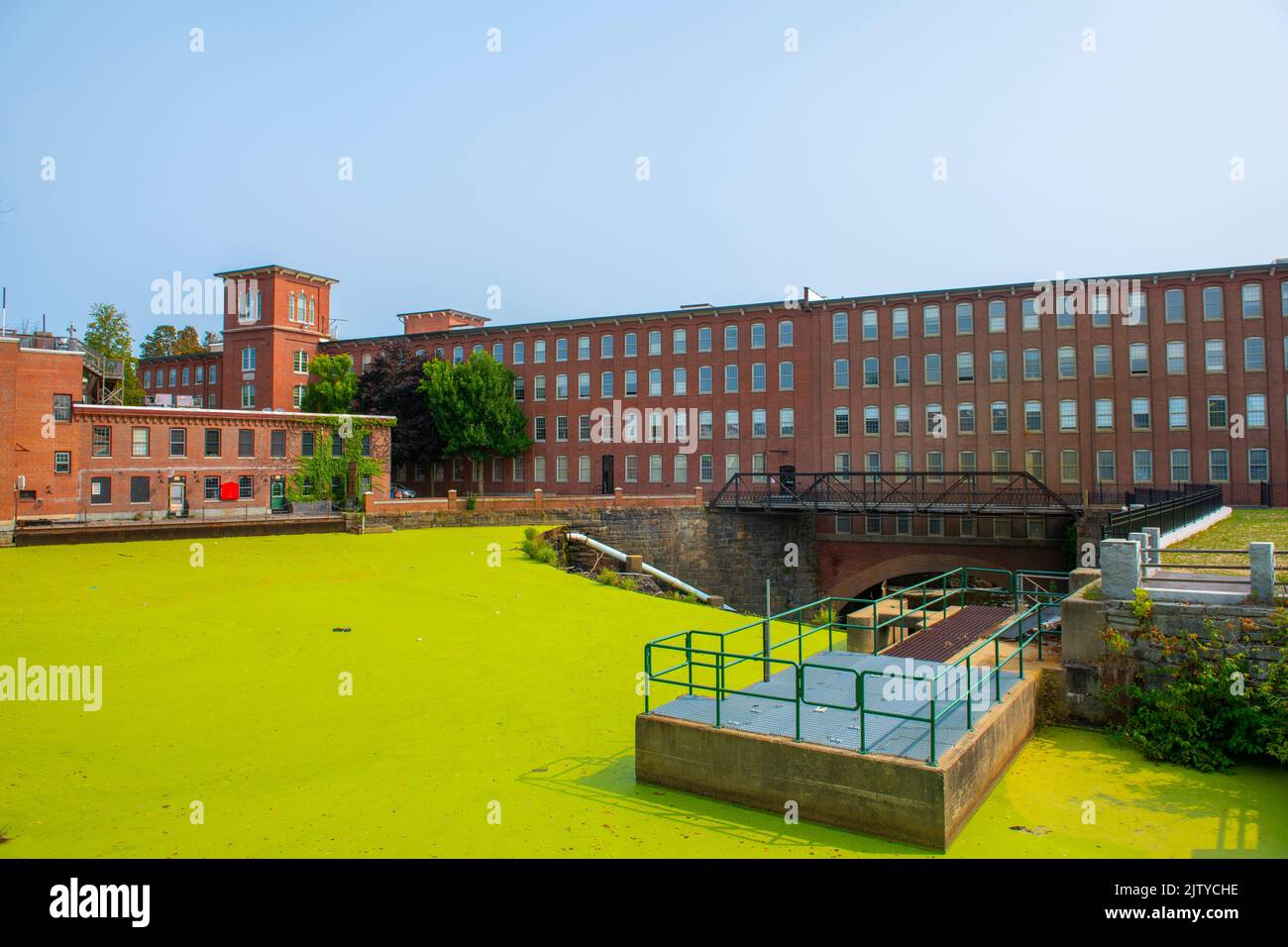 Cocheco Mill building across over Cocheco River in historic city center ...