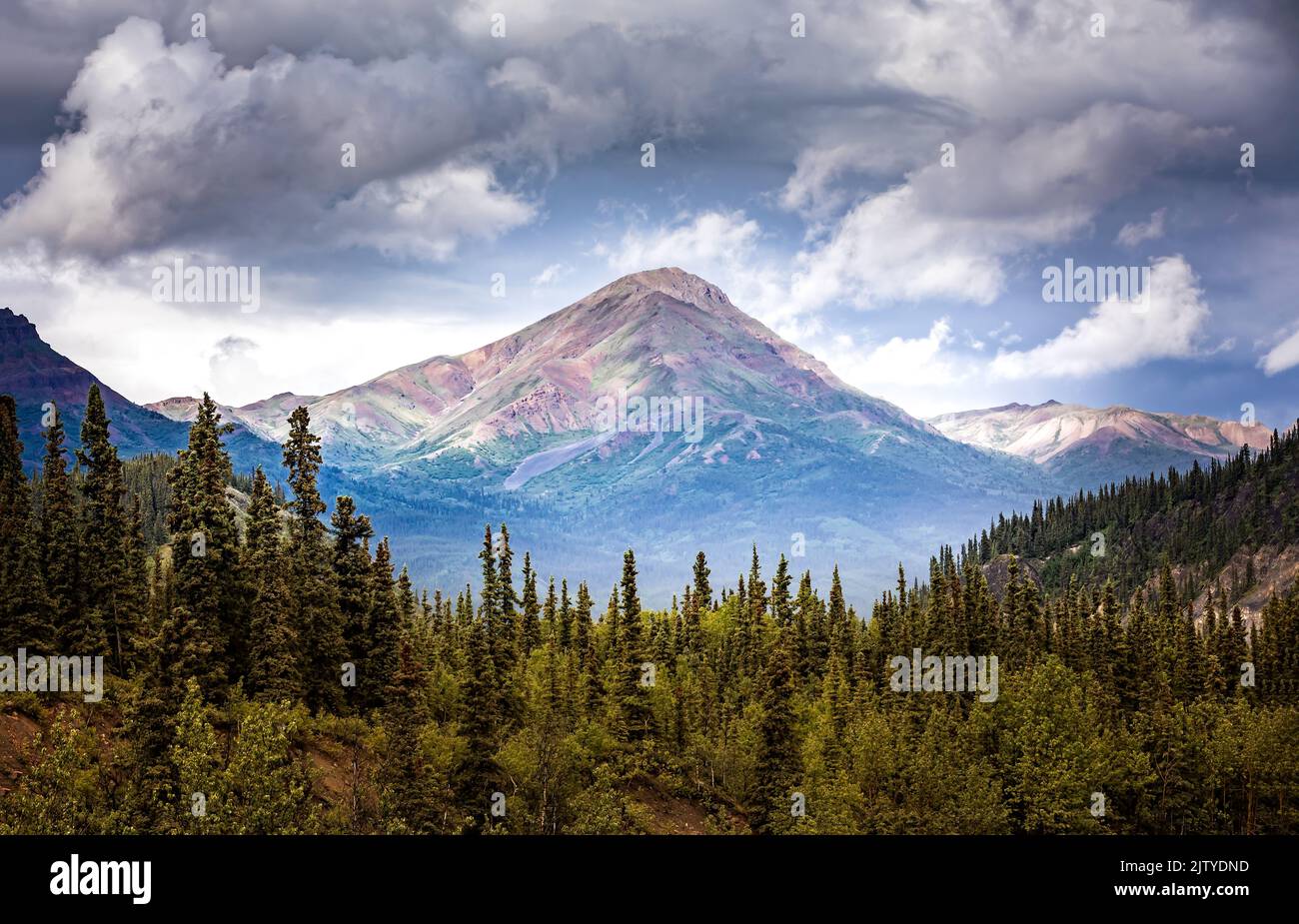 Dramatic louds above the mountain peaks of the Denali National Park ...