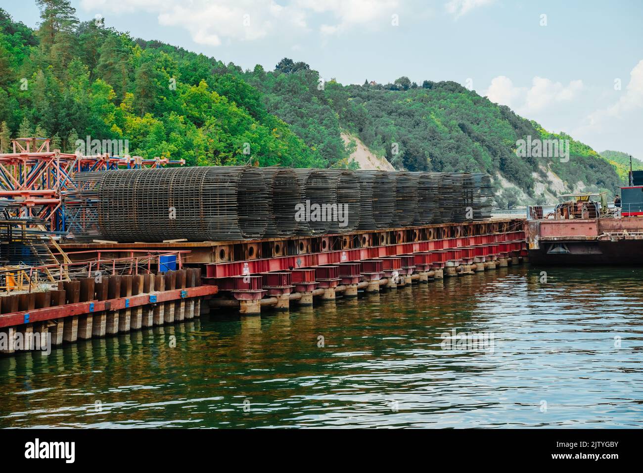 A grid of steel bars for building bridge. Bridge pile reinforcement ...