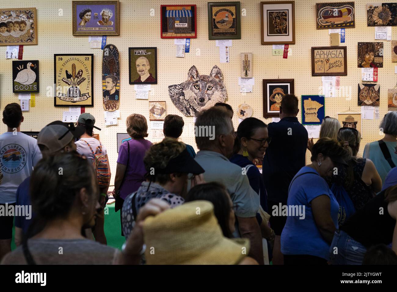 Visitors looking at the popular seed art competition display at the ...