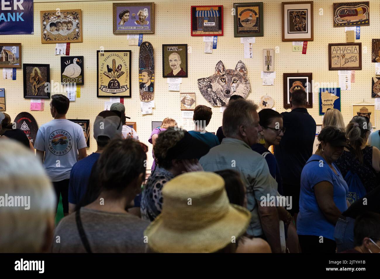 Visitors looking at the popular seed art competition display at the ...
