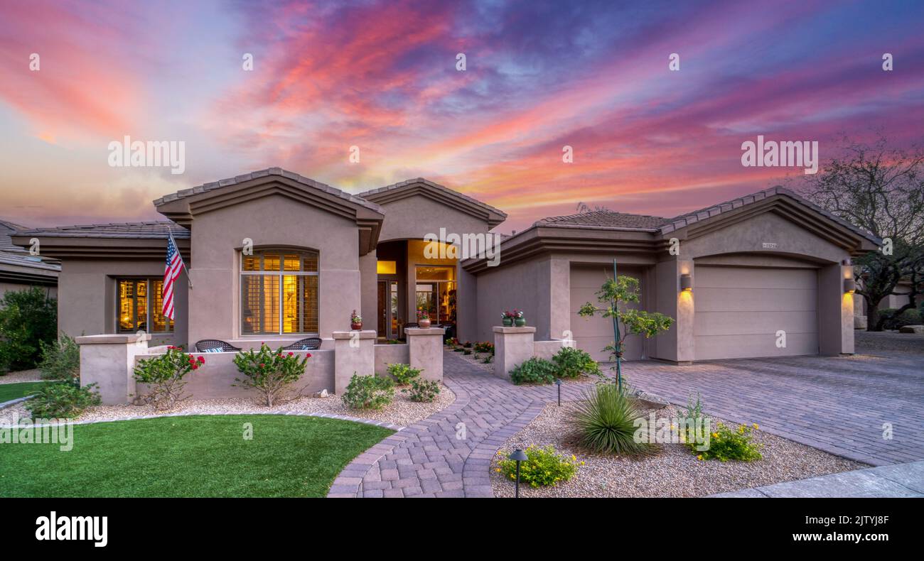 an newly built arizona home at sunset with a vibrant sky Stock Photo ...