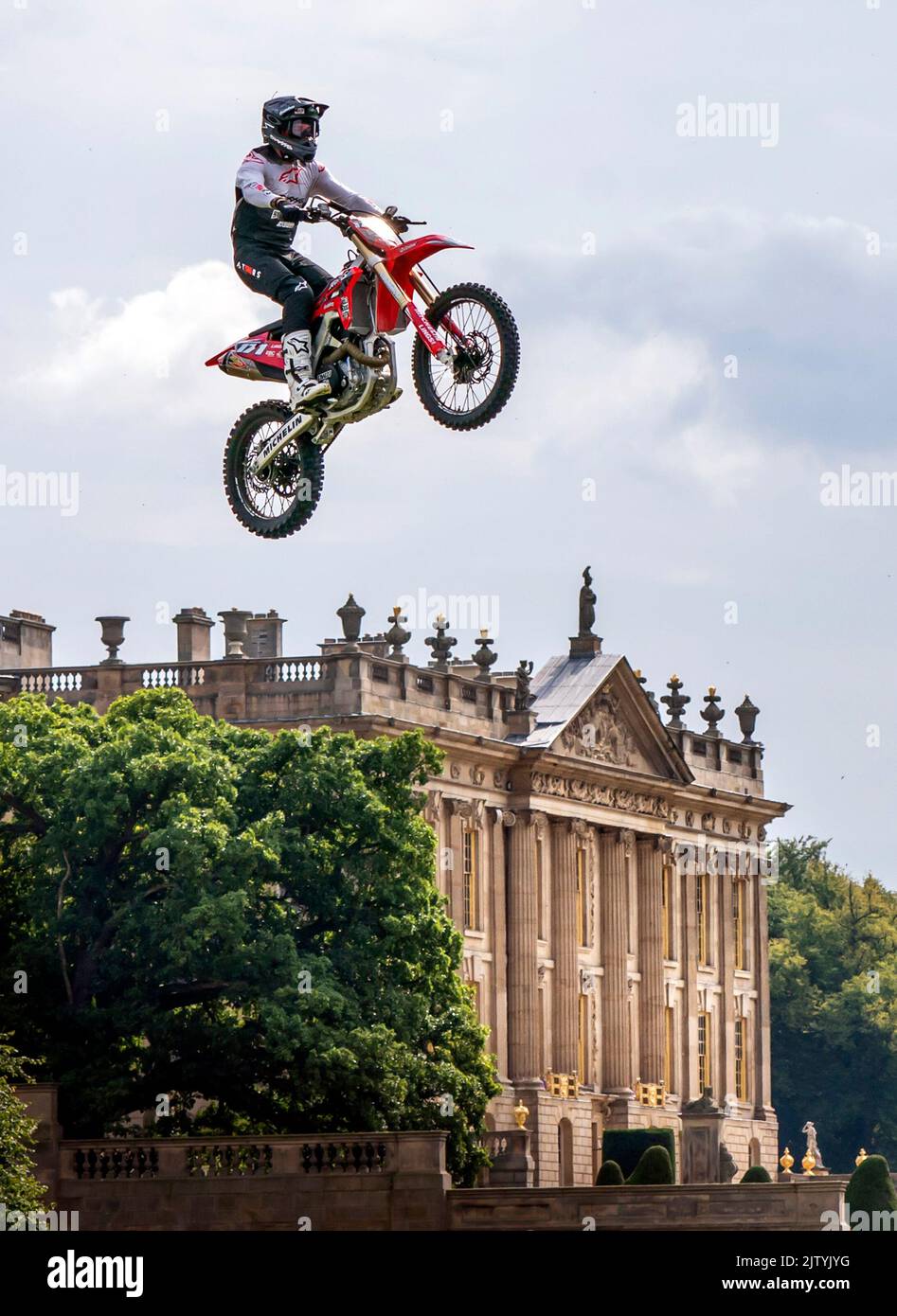 A member of the Bolddog Lings FMX Display Team performs over Chatsworth ...