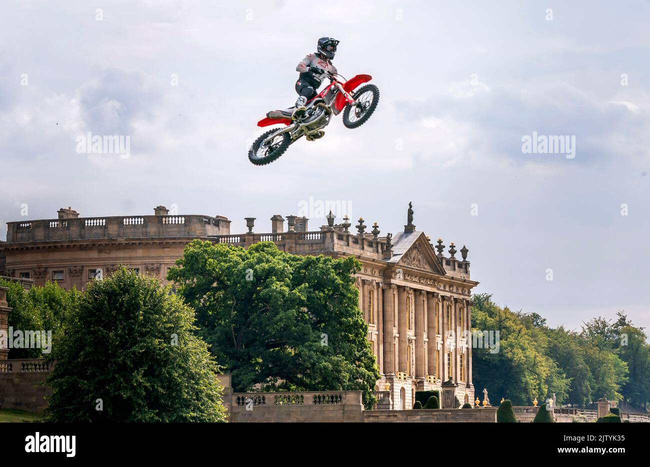 A member of the Bolddog Lings FMX Display Team performs over Chatsworth ...