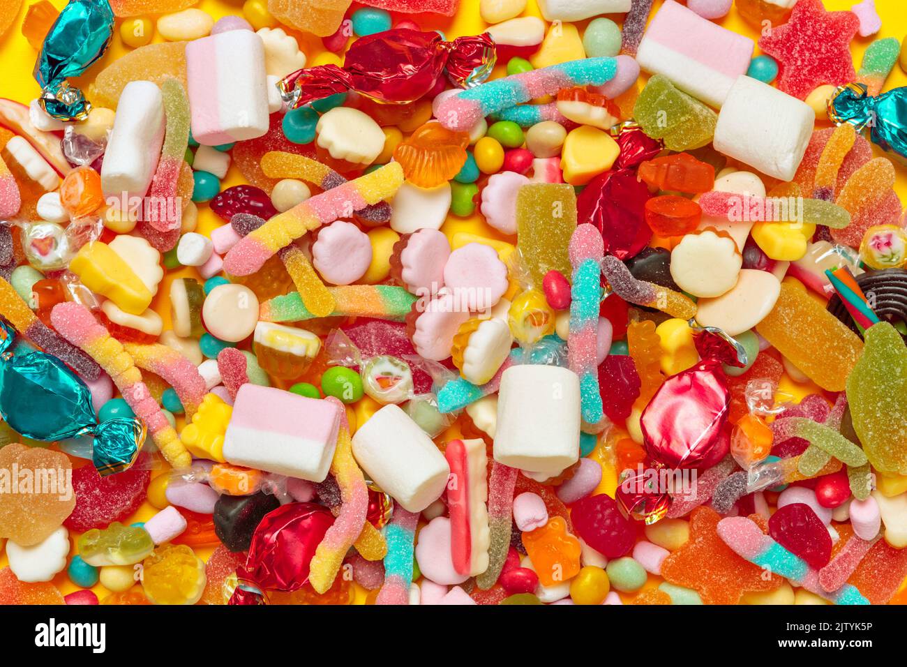 Different colorful fruit candy Stock Photo - Alamy