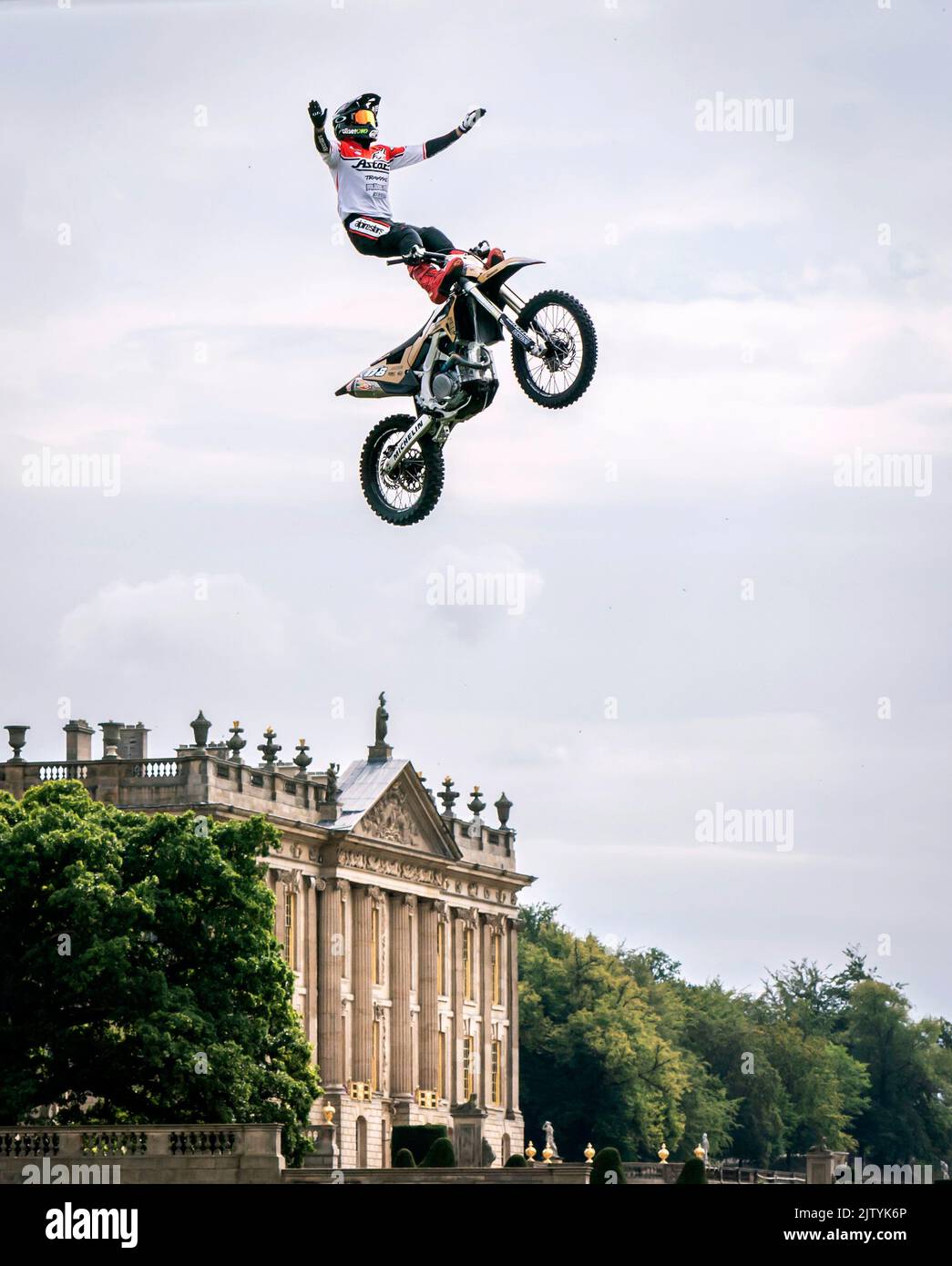 A member of the Bolddog Lings FMX Display Team performs over Chatsworth ...