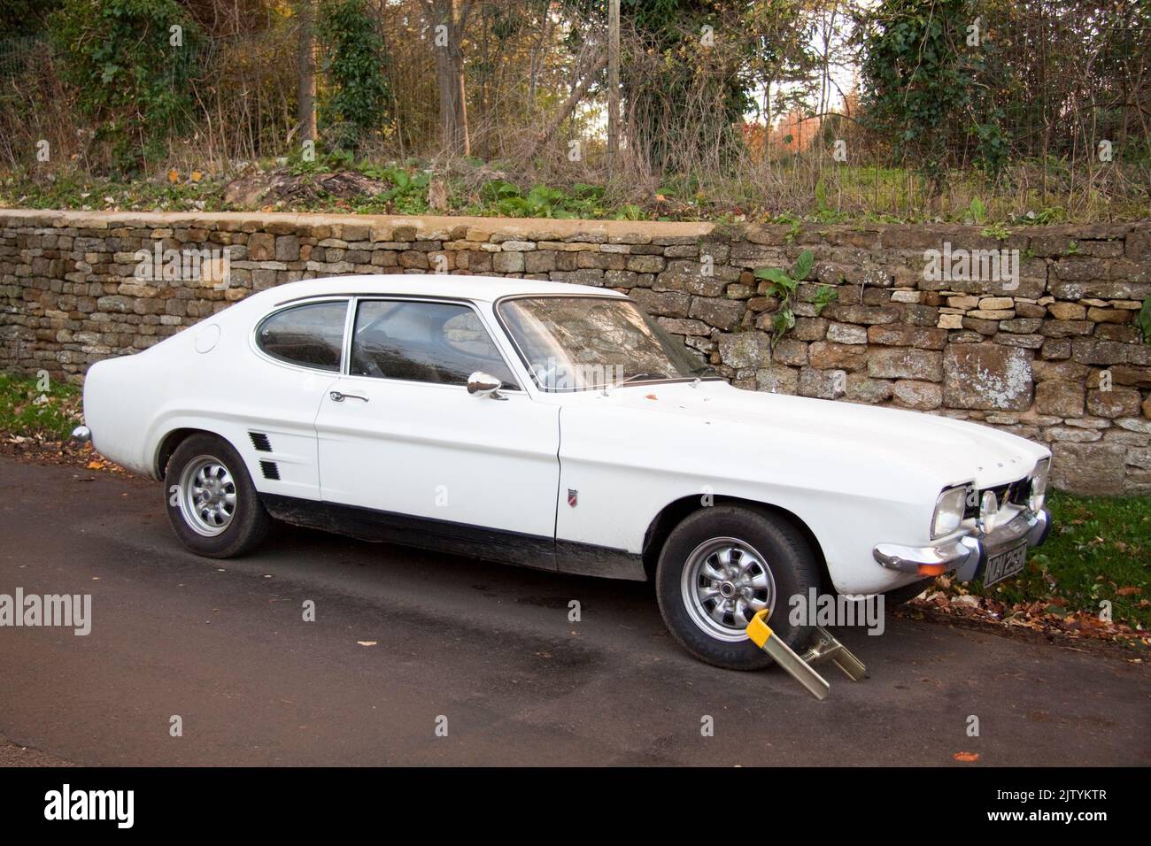 Ford Capri parked with Wheel Clamp Oxfordshire England uk Stock Photo ...