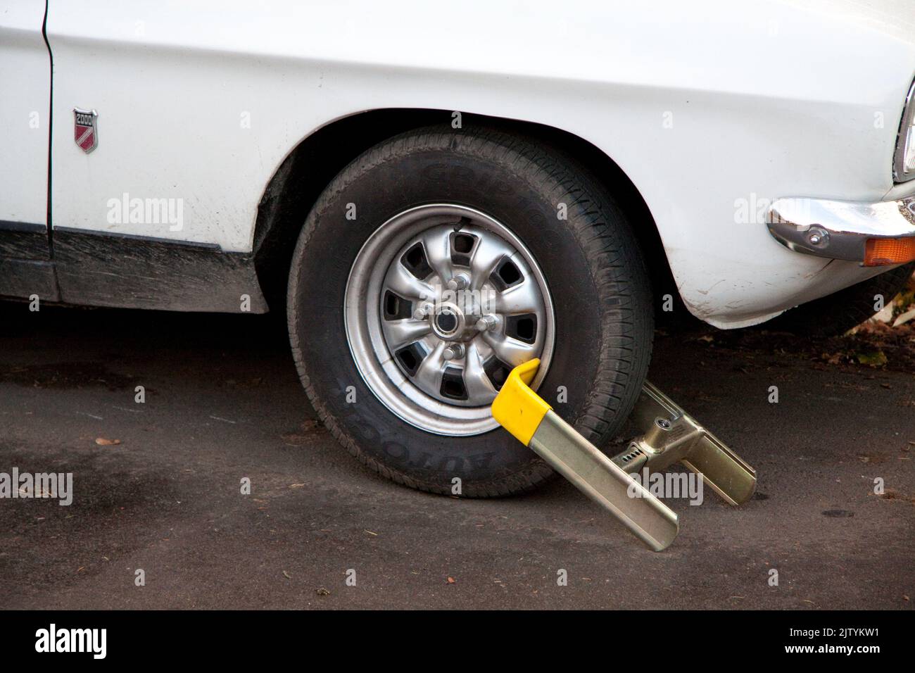 Ford Capri parked with Wheel Clamp Oxfordshire England uk Stock Photo ...