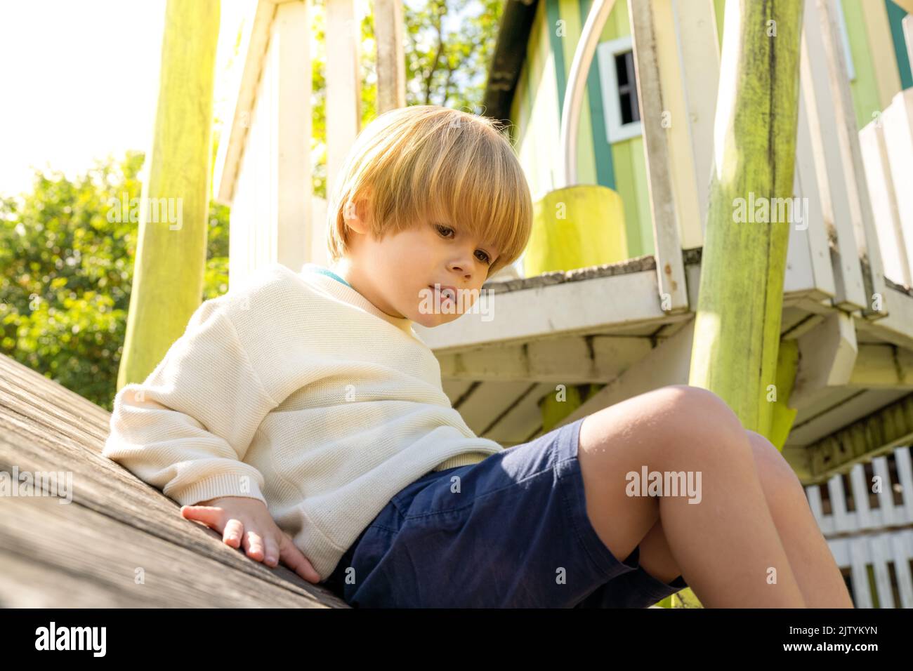 Adorable caucasian boy smiling happy playing at the park Stock Photo - Alamy