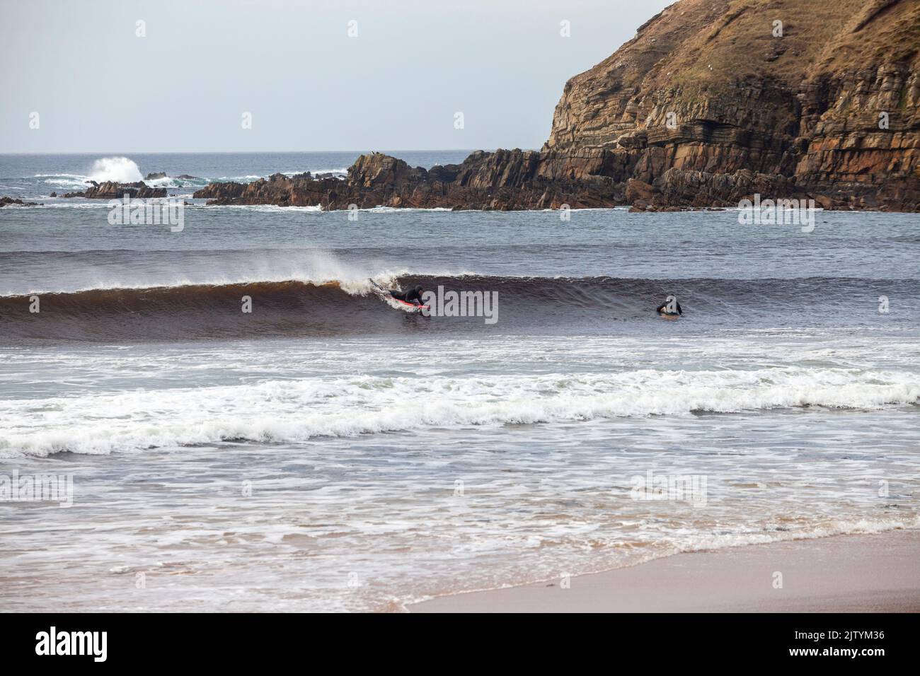 Surfing at Melvich Bay Sutherland along the North Coast 500 Stock Photo ...