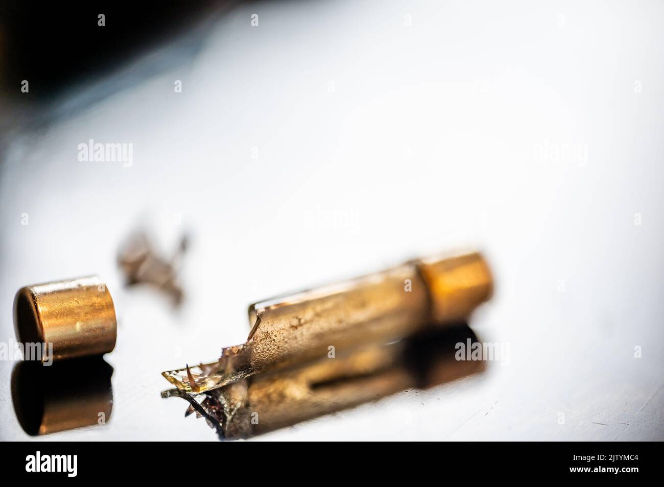 Brown damaged fuse that has blown and defective Stock Photo - Alamy