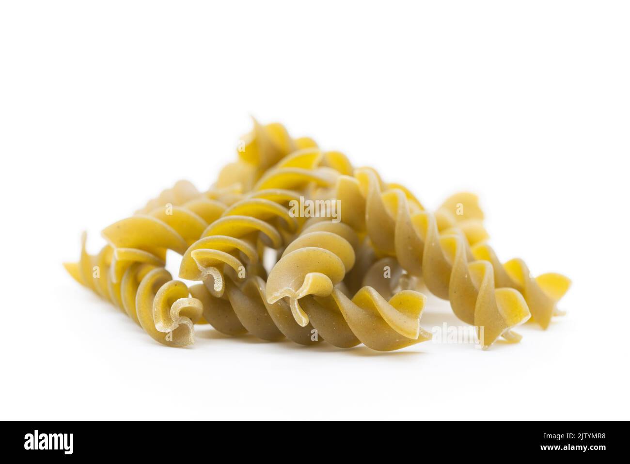 Pasta in a close up, green colored, vegan, pasta, fusilli, noodle ...