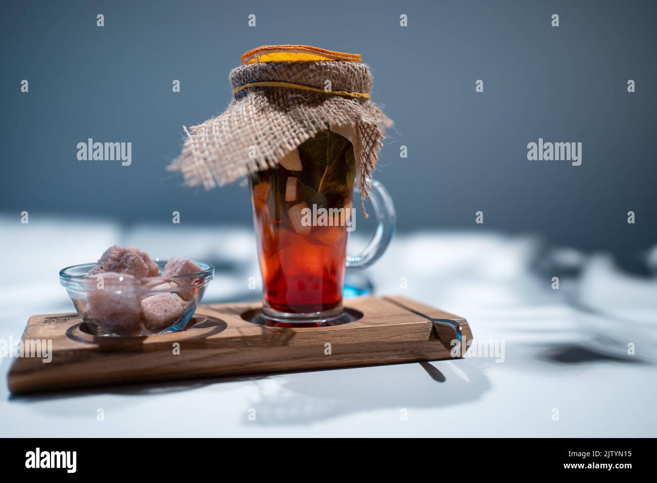 fresh vitamin red ginger tea cup with strawberry, mint, pink sugar ...