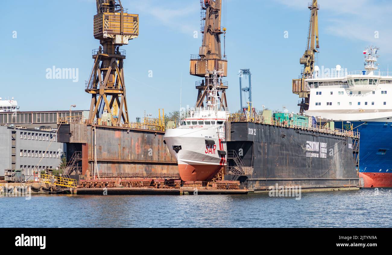 A picture of a ship being repaired in the Gdansk Shipyard Stock Photo ...