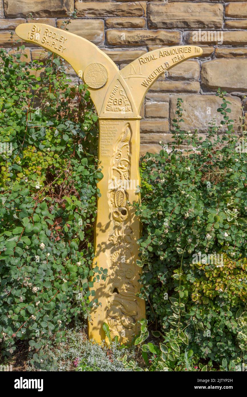 National Cycle Network 66 marker post on the River Aire towpath in ...