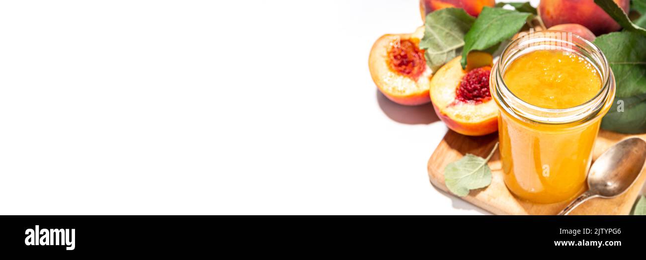 Peach jam in small jar. Homemade autumn peach jam with fresh fruits ...