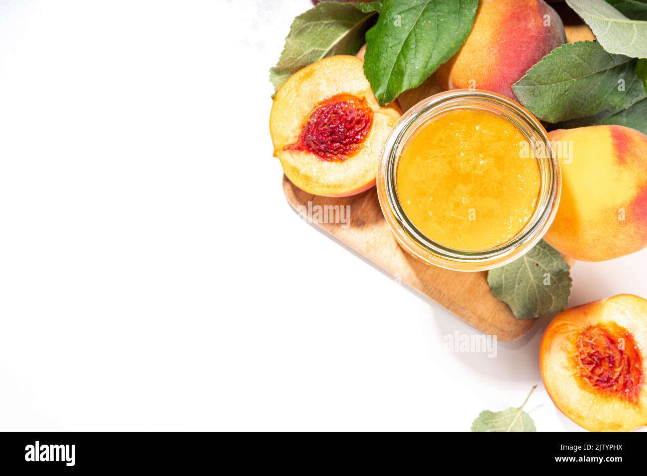 Peach jam in small jar. Homemade autumn peach jam with fresh fruits ...