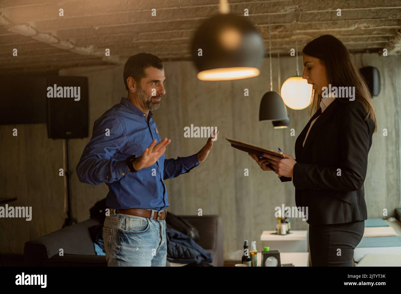 Two amazing and beautiful business people are having a conversation ...
