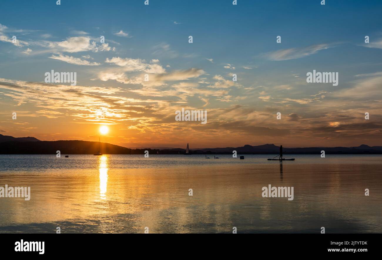 Stand Up Paddling at sunset at Lake Constance Stock Photo - Alamy