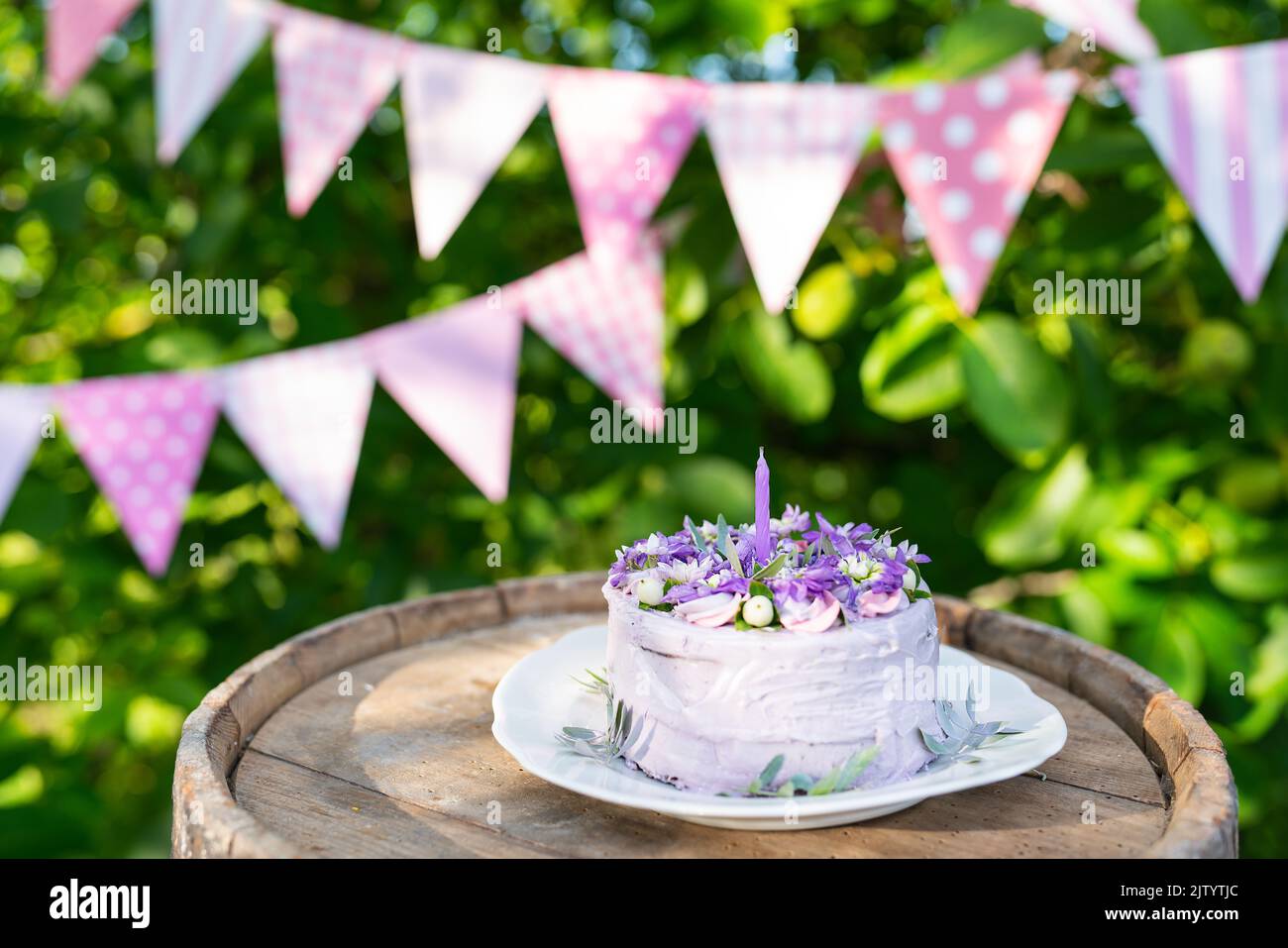 Very beautiful bento cake with purple, veri peri, matthiola flowers ...