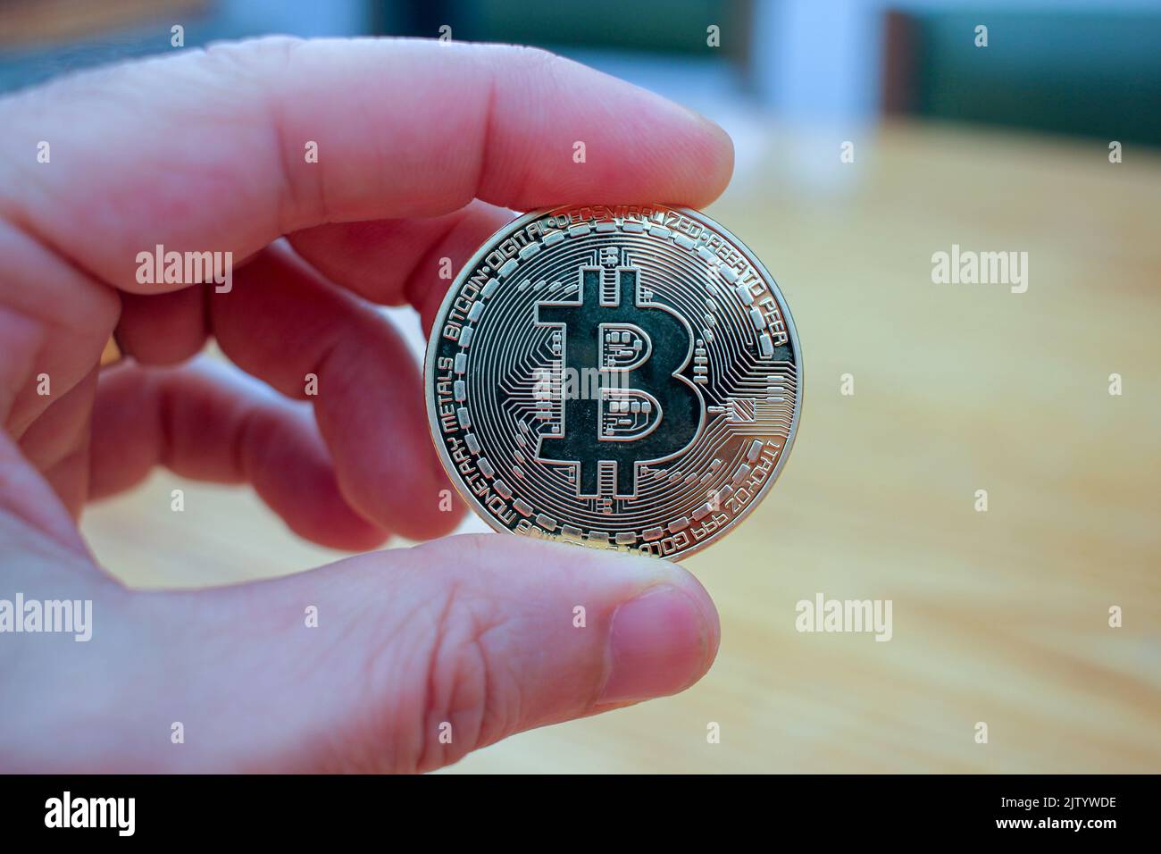 holding the coin of the future between my fingers is great Stock Photo ...