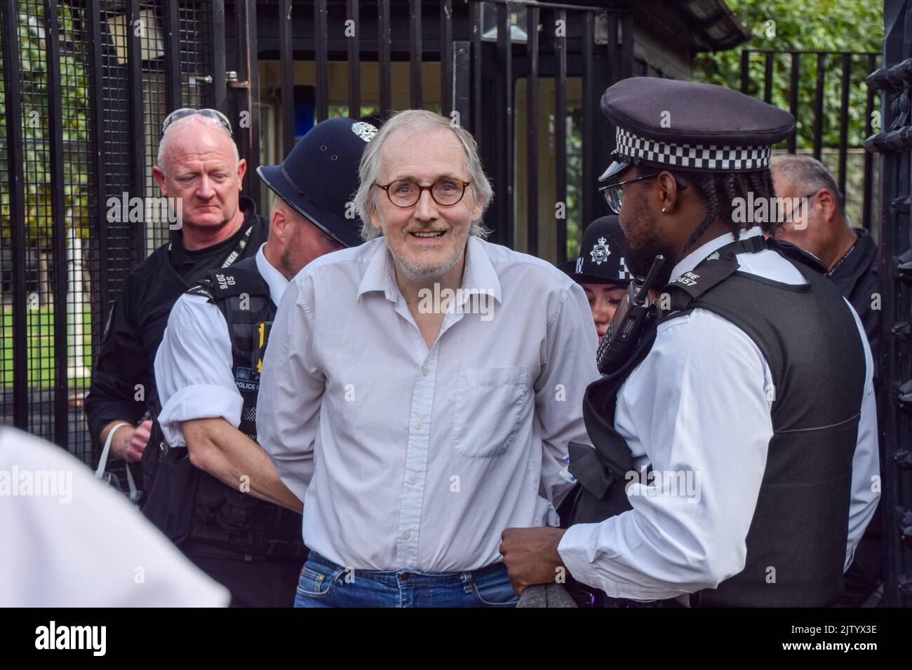 London, UK. 2nd September 2022. Police arrest a protester who was glued ...