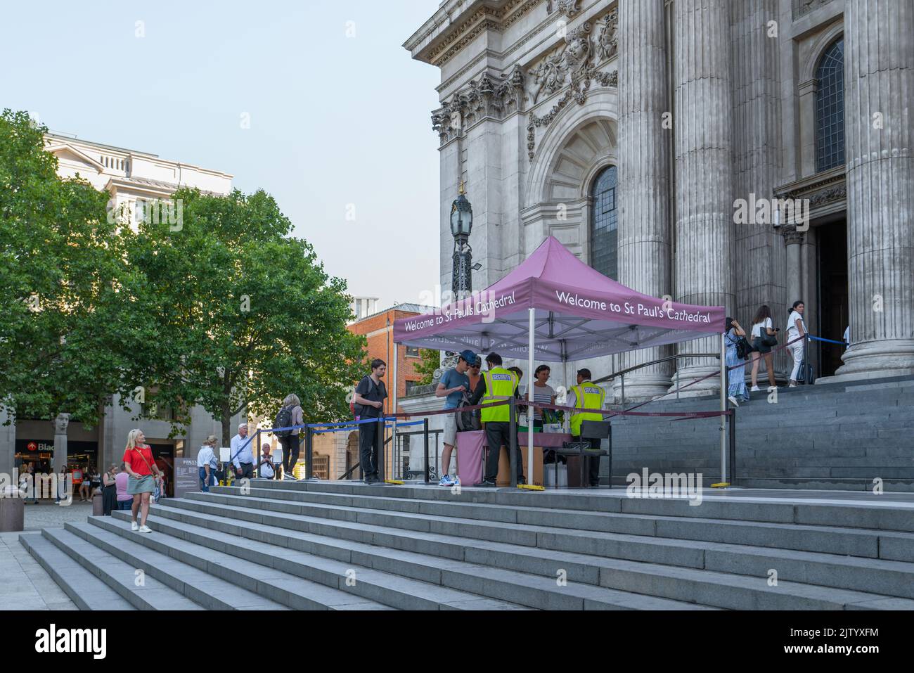 London, UK - August 26, 2022: Visitors go through security bag check before entering St. Pauls ...