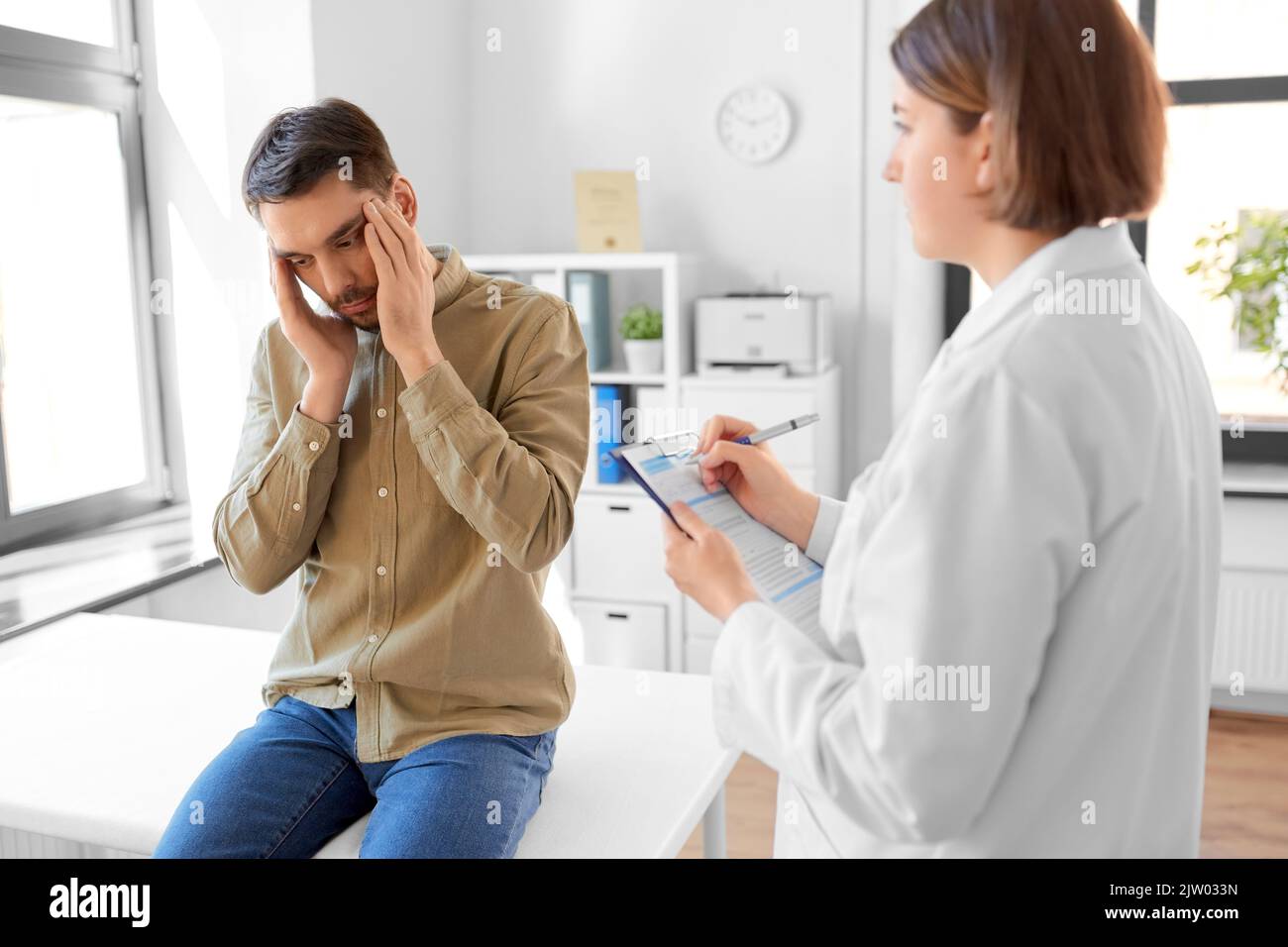 doctor and man with health problem at hospital Stock Photo - Alamy