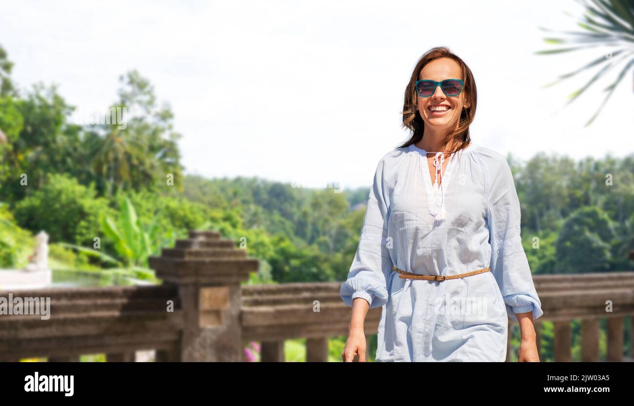 Woman walking on terrace hi-res stock photography and images - Alamy