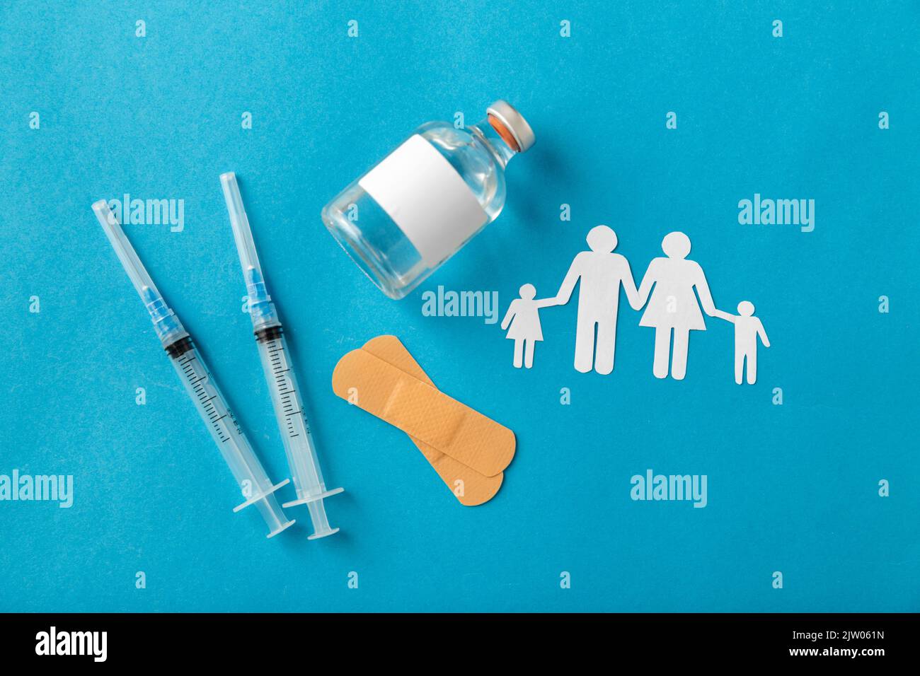 syringes and family pictogram on blue background Stock Photo - Alamy