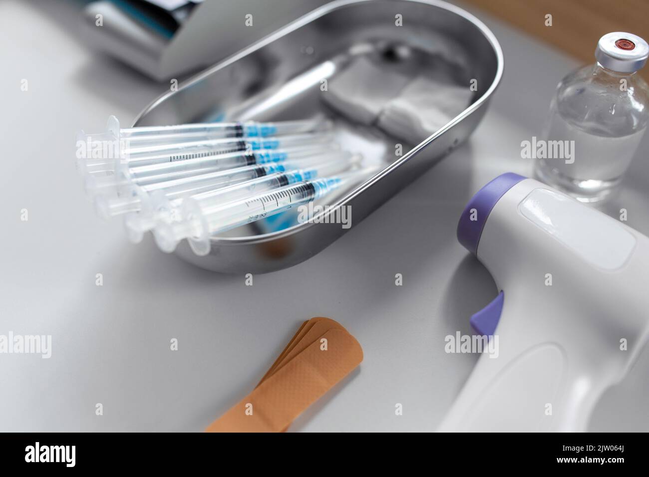 disposable syringes on table at hospital Stock Photo - Alamy