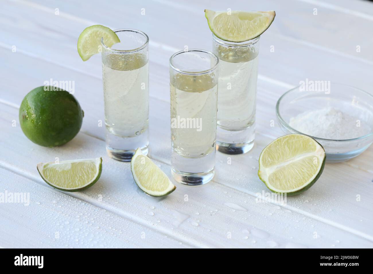 glasses of alcohol drink with lime and salt Stock Photo - Alamy