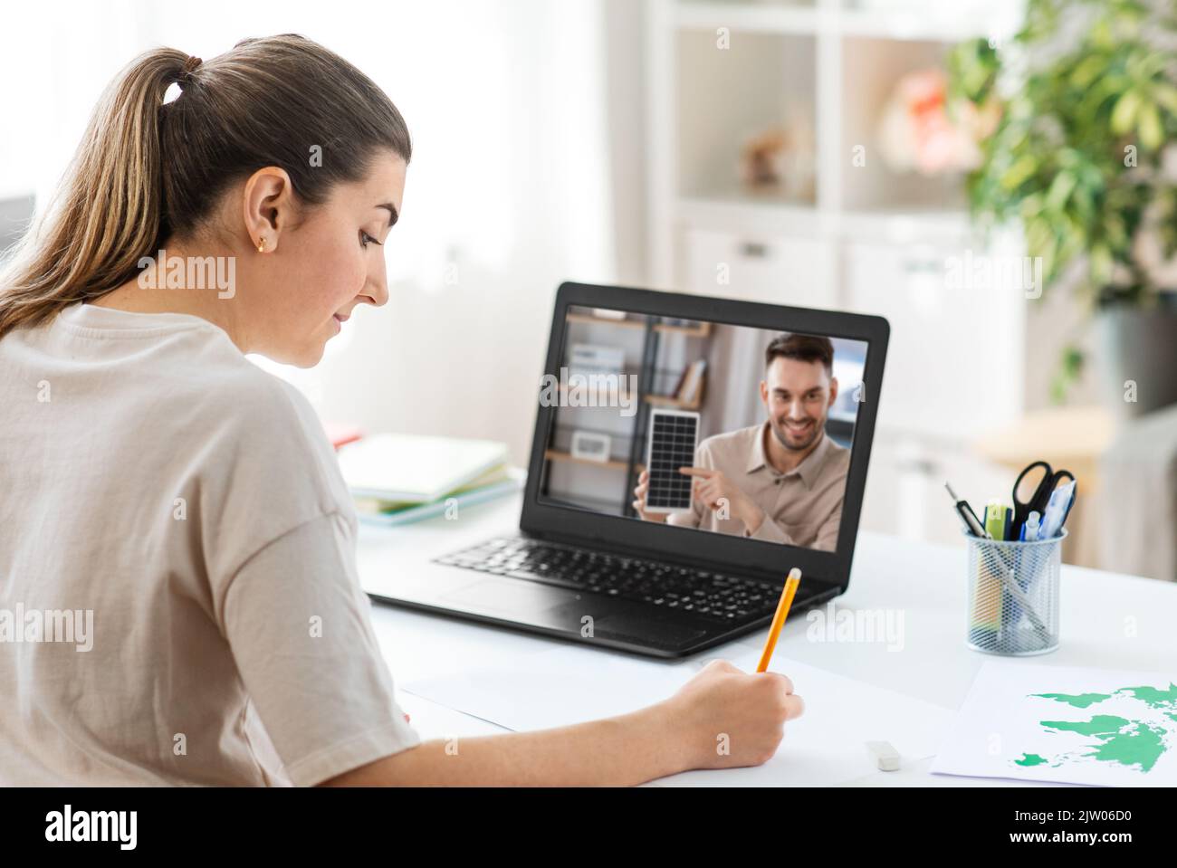 student with laptop having online class at home Stock Photo - Alamy