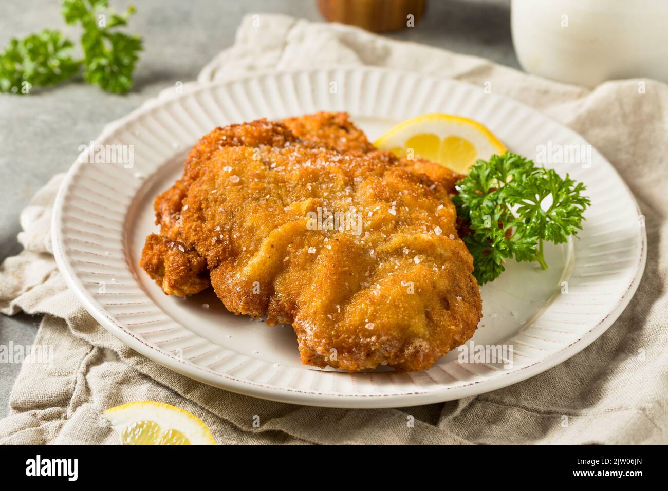 Homemade Deep Fried German Pork Schnitzel with Salt and Lemon Stock ...