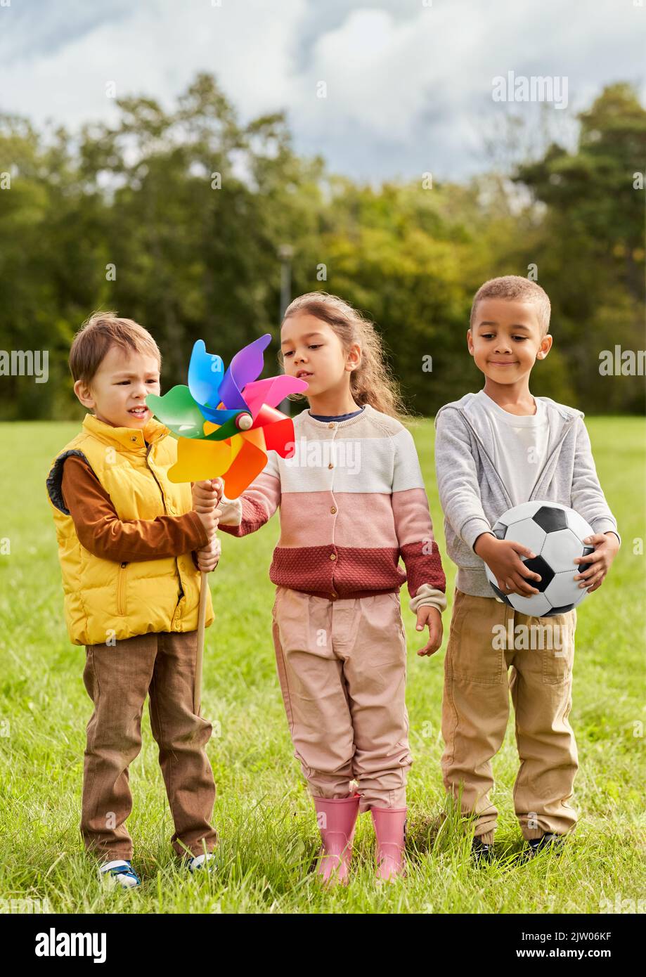 Kids pinwheel hi-res stock photography and images - Alamy